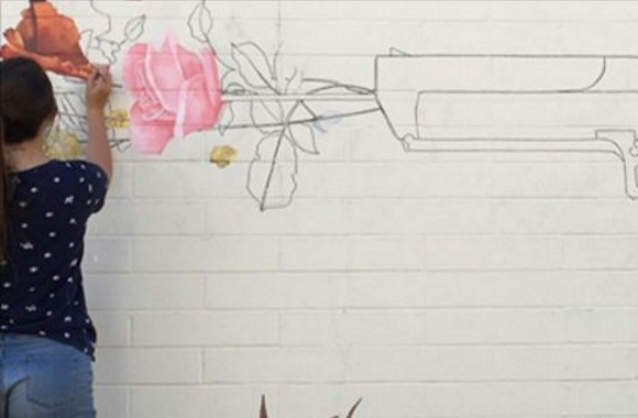One student calls mural of gun shooting flowers ’emotionally triggering ...