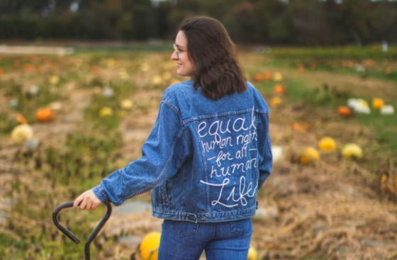 College grad spreads pro-life message one dress, jacket and tie at a ...