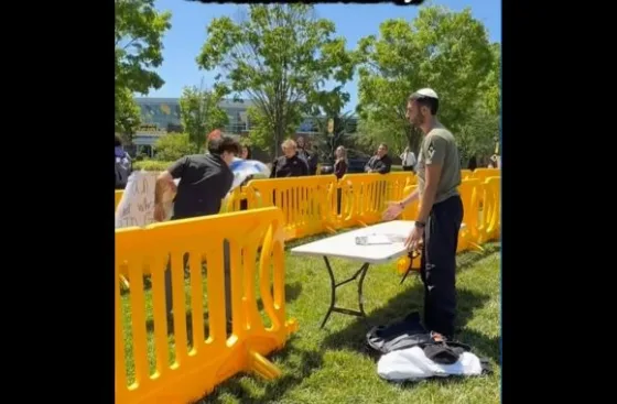‘You’re a terrorist!’: Student destroys former Israeli soldier’s sign ...